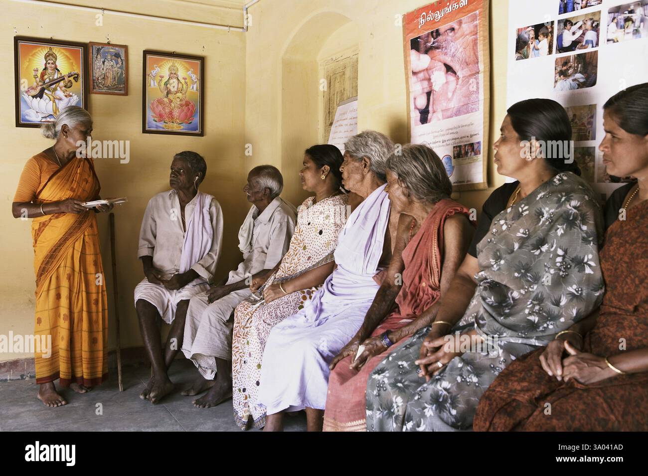 Health worker NGO Chinmaya Organization Rural Development CORD giving ...