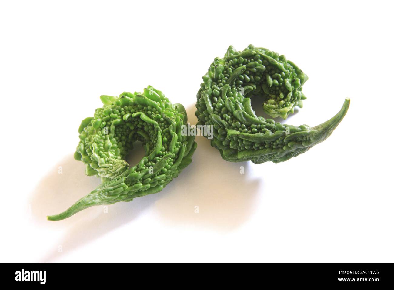 Green vegetable, karela bitter gourd momordica charantia on white ...