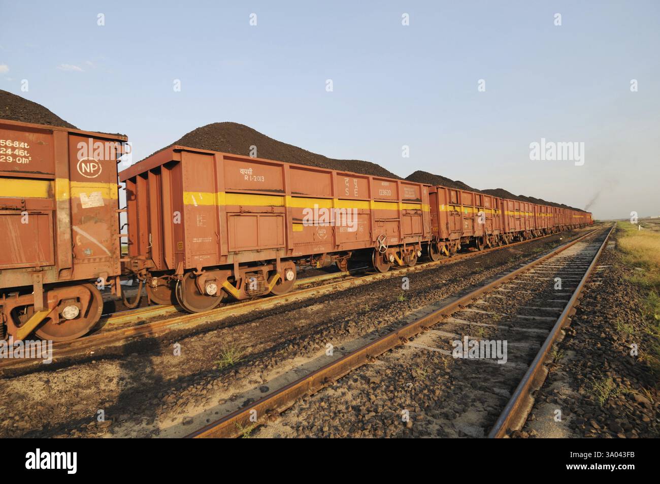 Goods train carrying coal at Adani Power, Mundra, Kutch, Gujarat, India ...