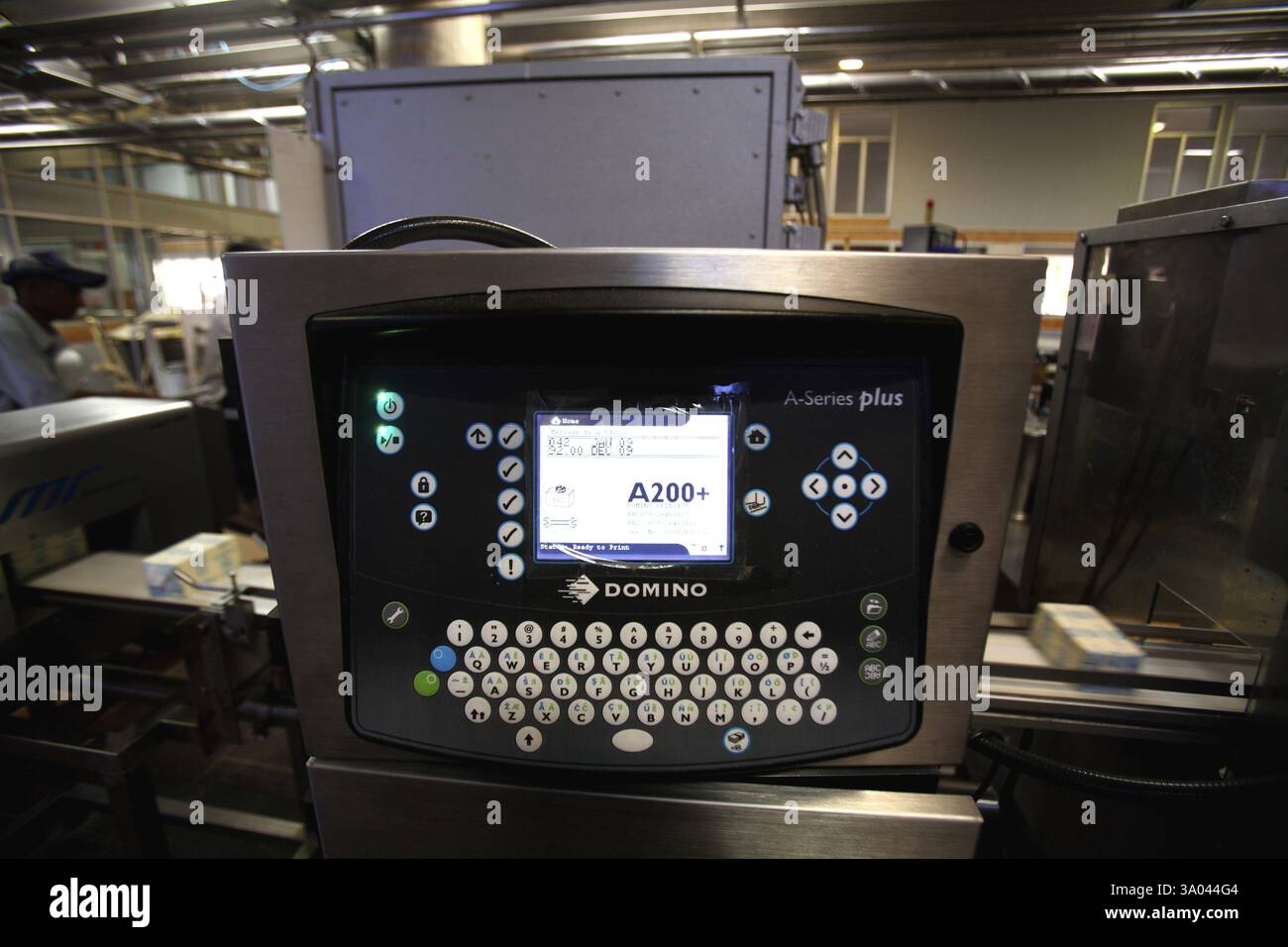 Computerized weight machine at Amul factory in Anand, Gujarat, India ...