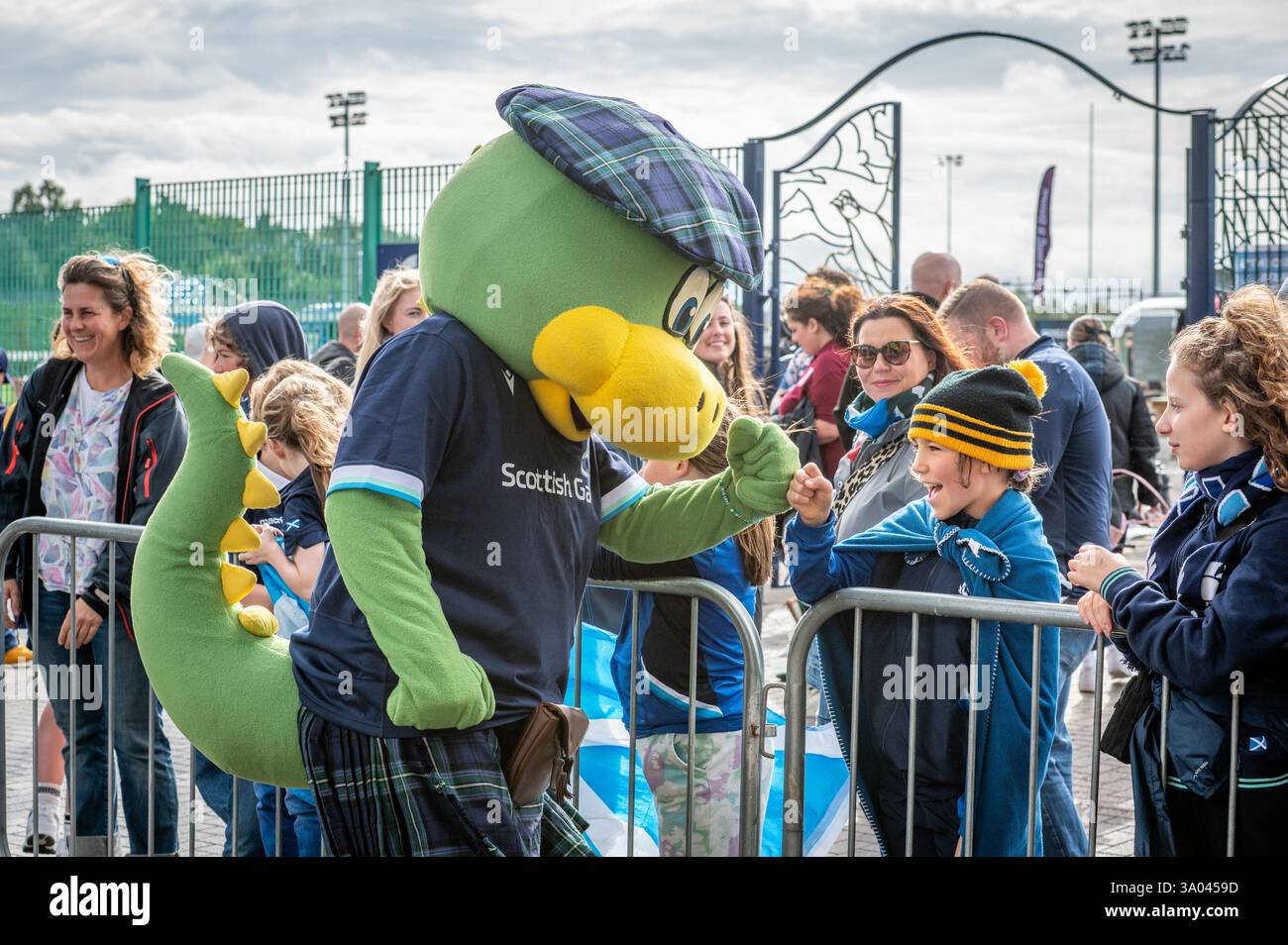 Lochie, the SRU mascot, greets fans as they wait to see the teams ...