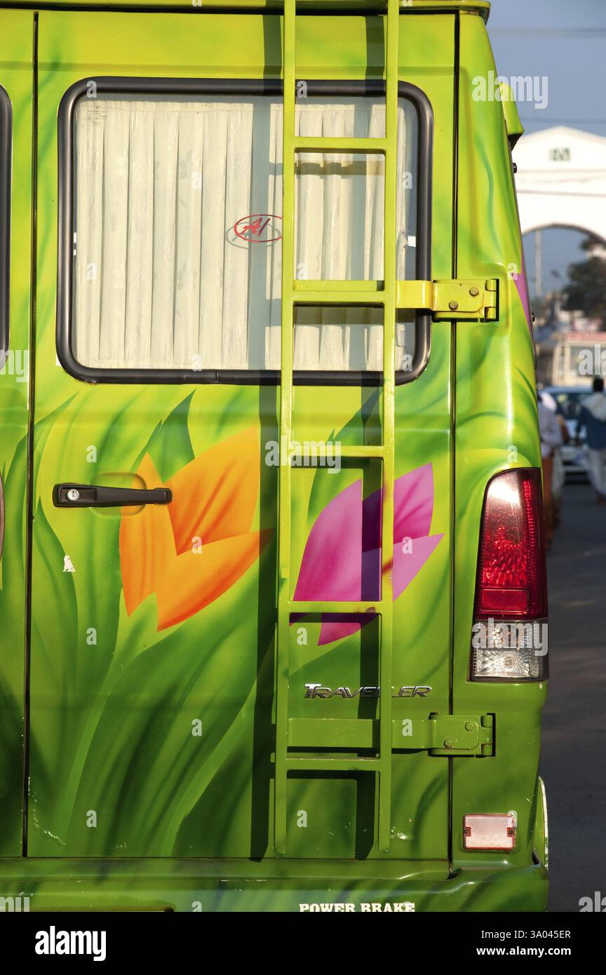 Colourful flower and leaves painted on bus with ladder, Trivandrum ...