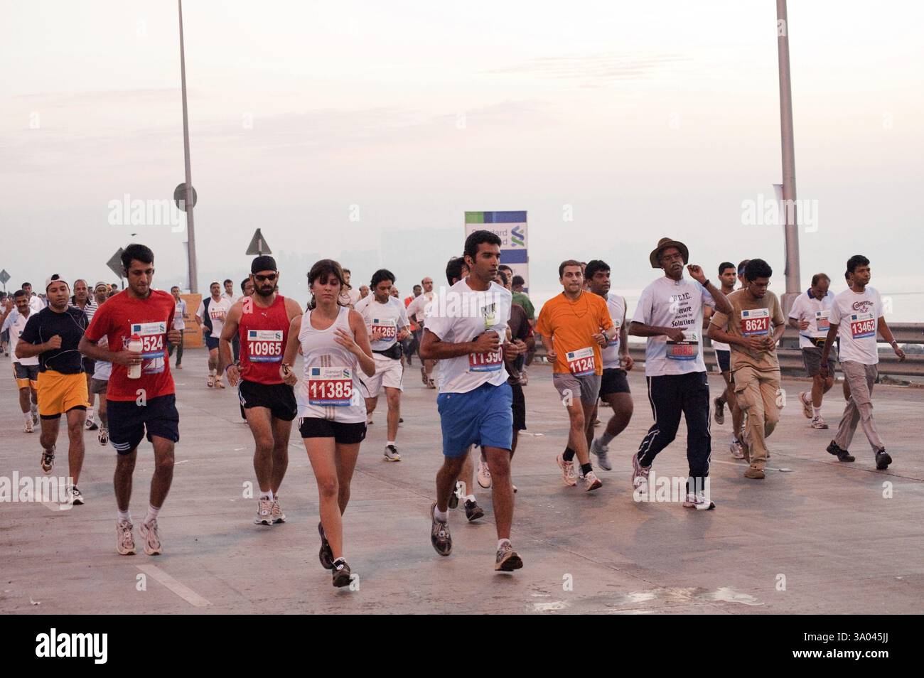 Marathon runners on sea link, Bombay Mumbai, Maharashtra, India NOMR ...