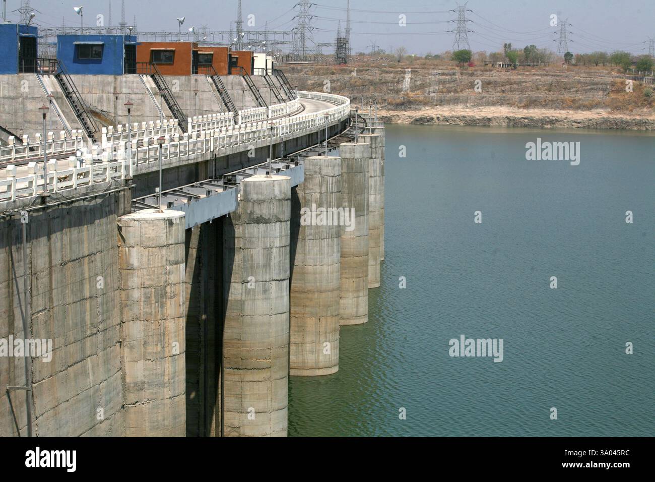 Columns of Indira Sagar Dam standing tall on river Narmada under multi ...