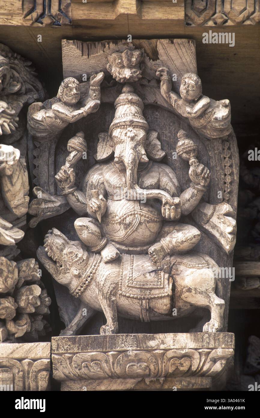 Ganesh wooden carving statues in old temple chariot at Madurai, Tamil ...