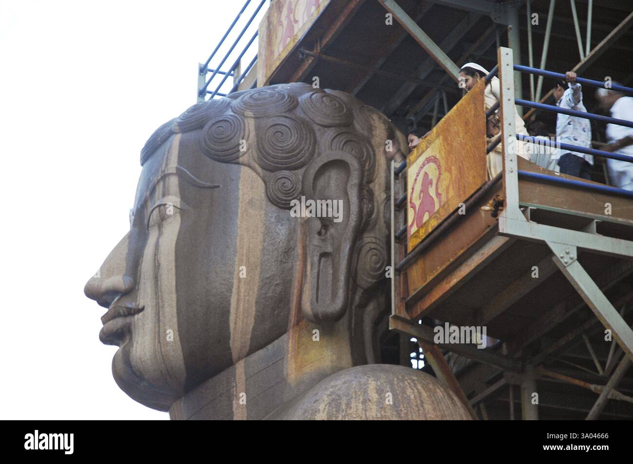 Jain Devotees pouring Vermillion Water on the head of 58.8 feet ...