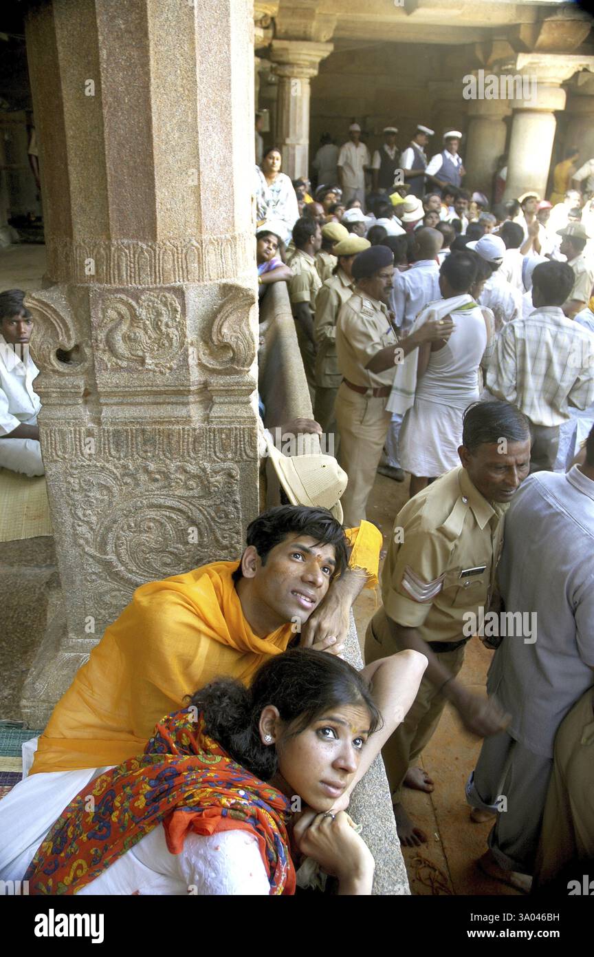 Young pilgrims watch in awe and devotion at the 48 feet tall monolithic ...
