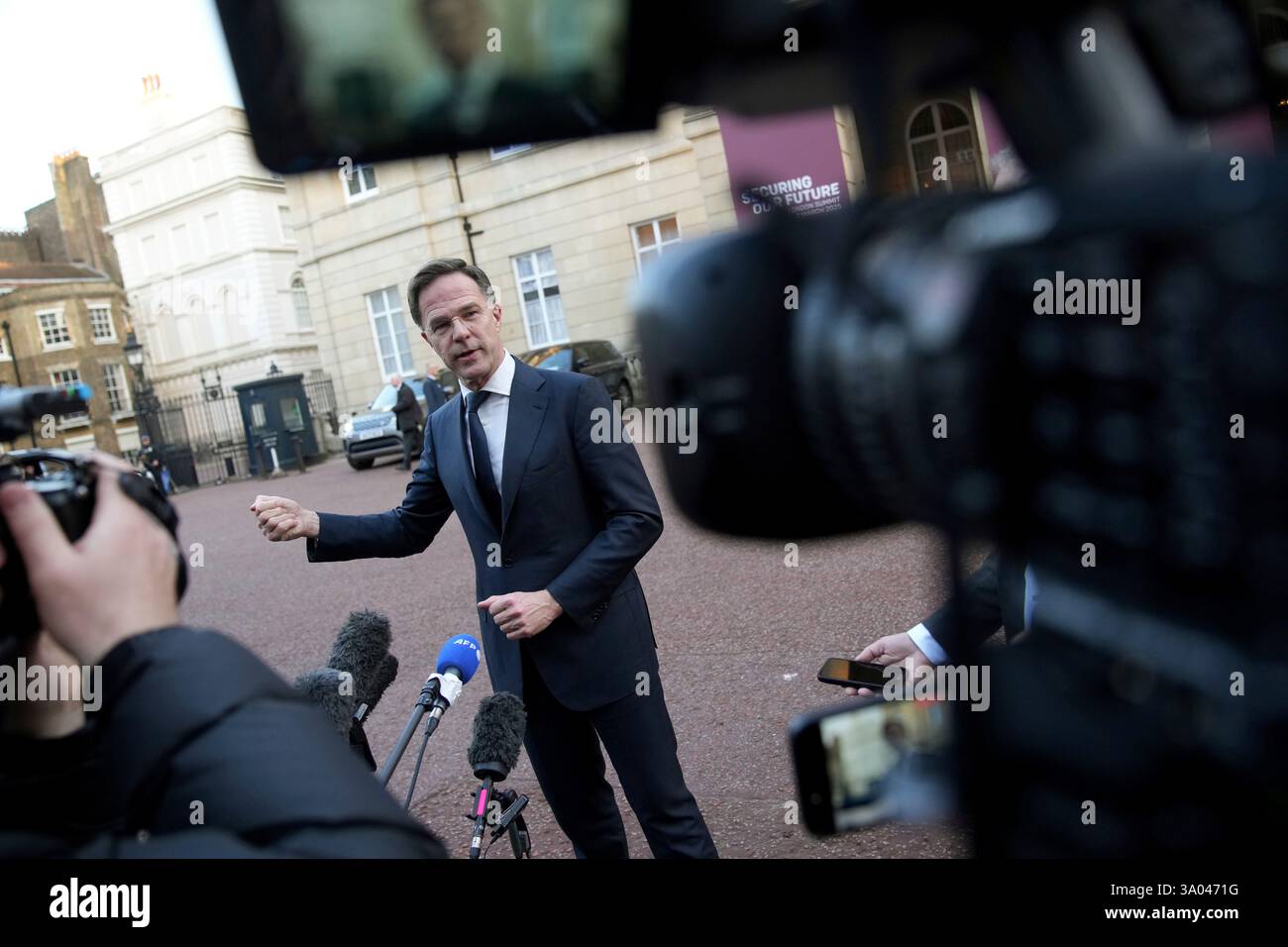 NATO Secretary General Mark Rutte speaks with the media as he departs ...