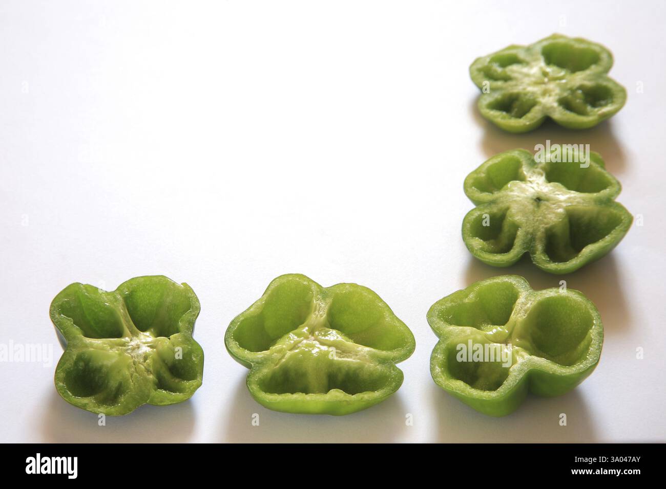 Spices, half cut green chillies capsicum shimla mirch capsicum annuum ...