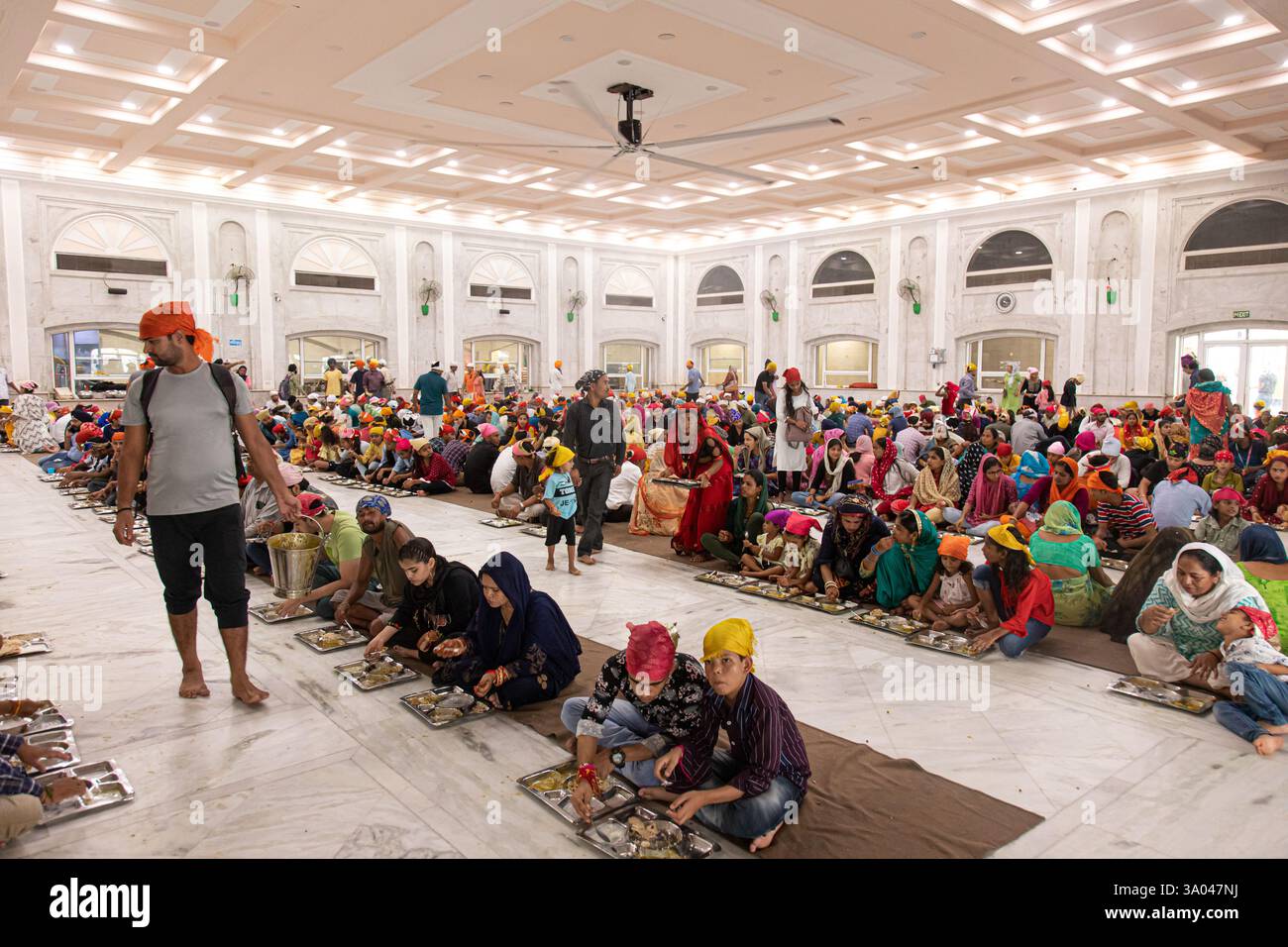 Delhi, India - 8-16-2022: pilgrims and tourists in Gurudwara Bangla ...
