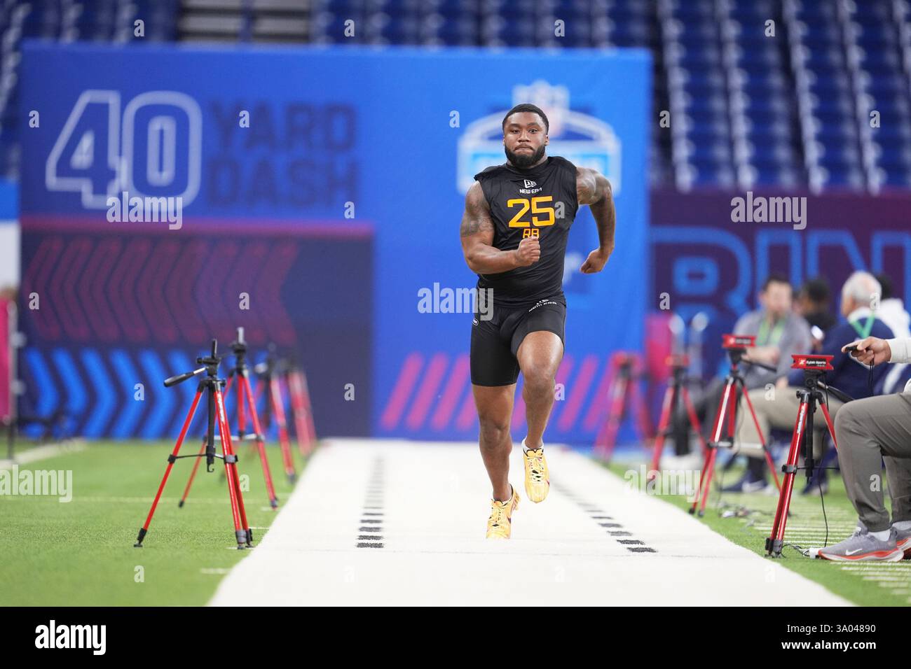 Kansas running back Devin Neal runs the 40-yard dash at the NFL ...