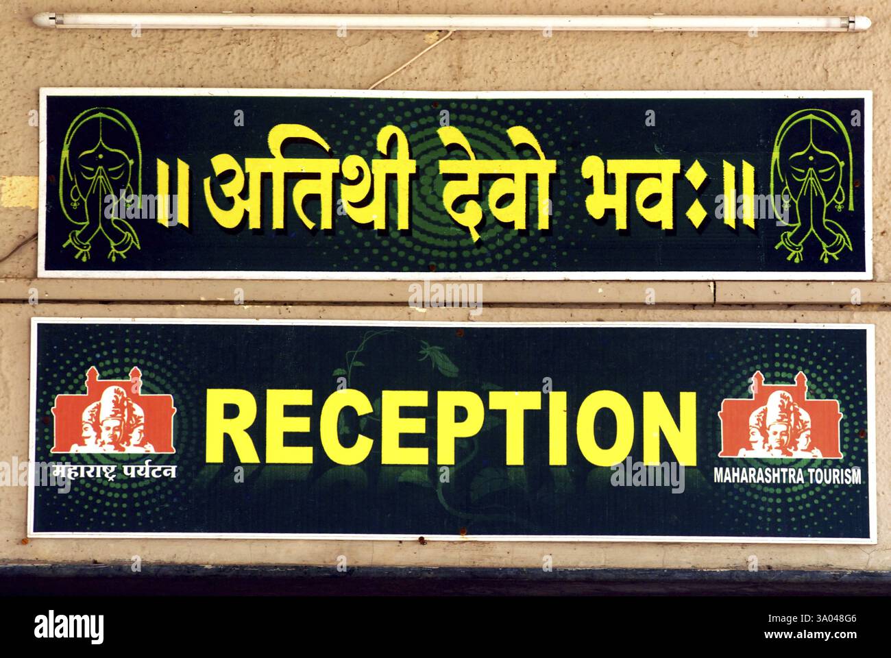 Guest is god board in deonagari script and reception at resort of ...