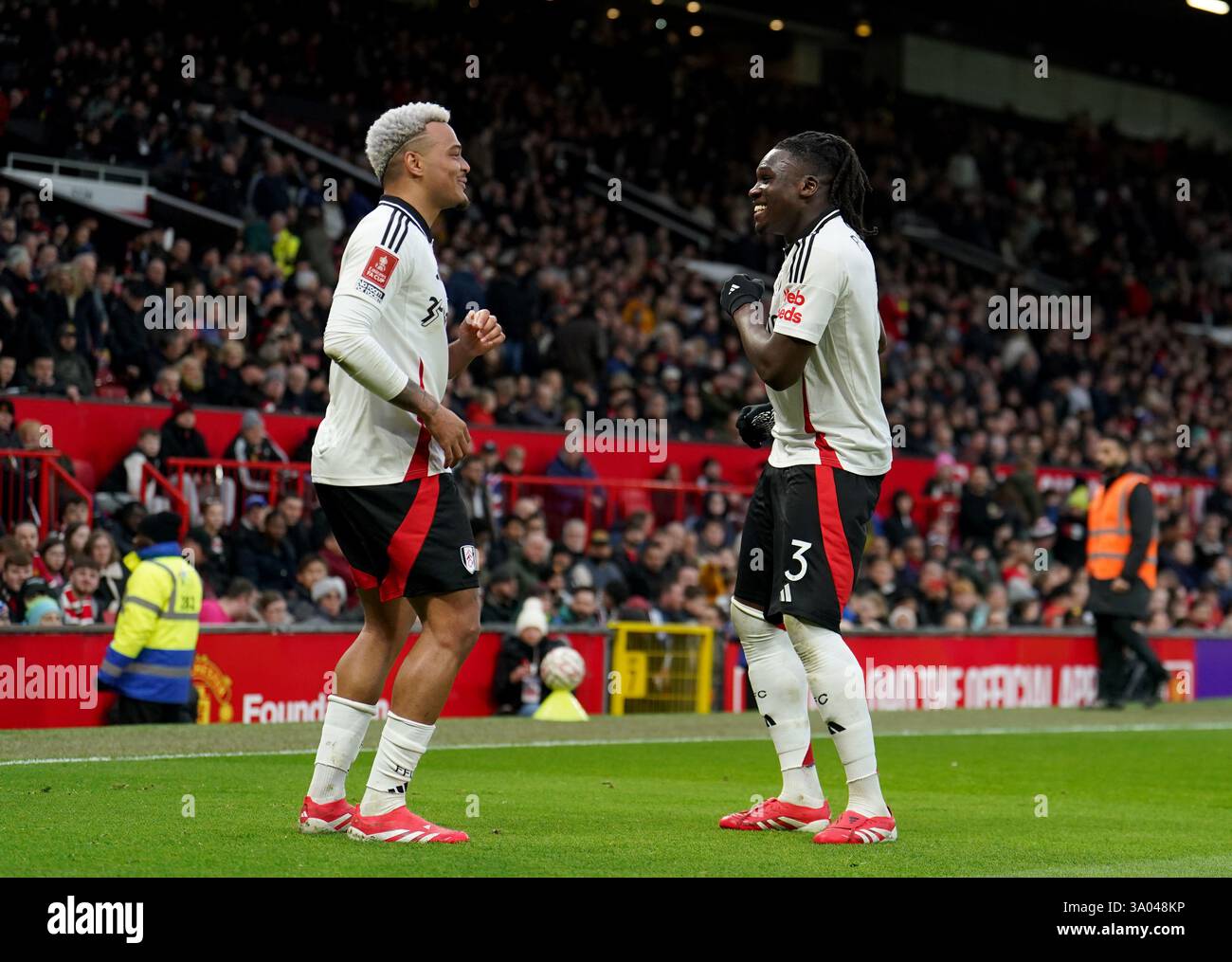 Fulham's Calvin Bassey (right) celebrates scoring their side's first ...