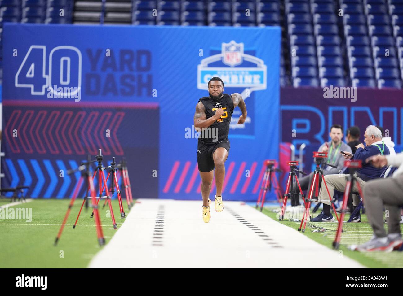 Kansas running back Devin Neal runs the 40-yard dash at the NFL ...