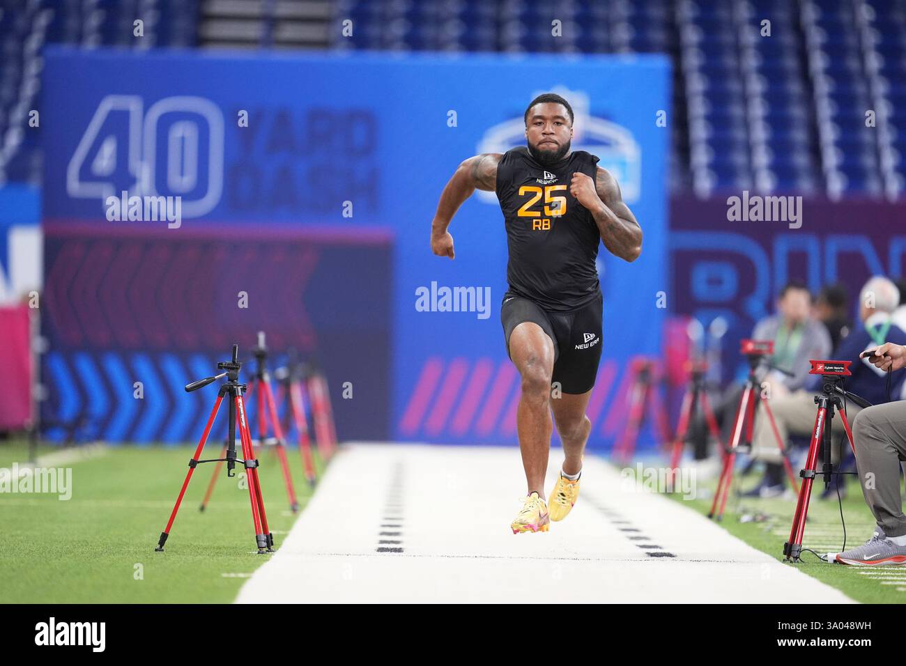 Kansas running back Devin Neal runs the 40-yard dash at the NFL ...