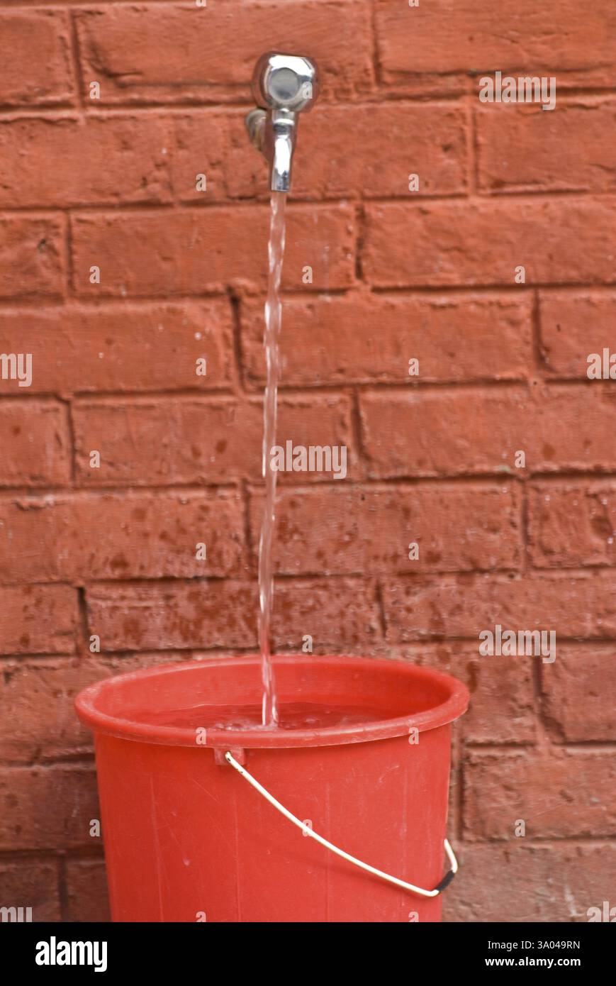 Water faucet tap bucket hi-res stock photography and images - Alamy
