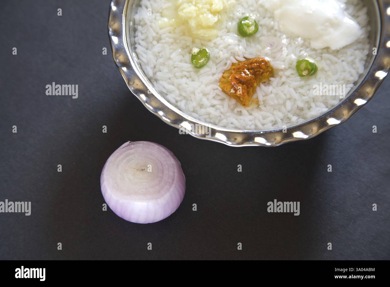 Indian lunch pakhala rice pickle mash potato with chillies and yoghurt ...