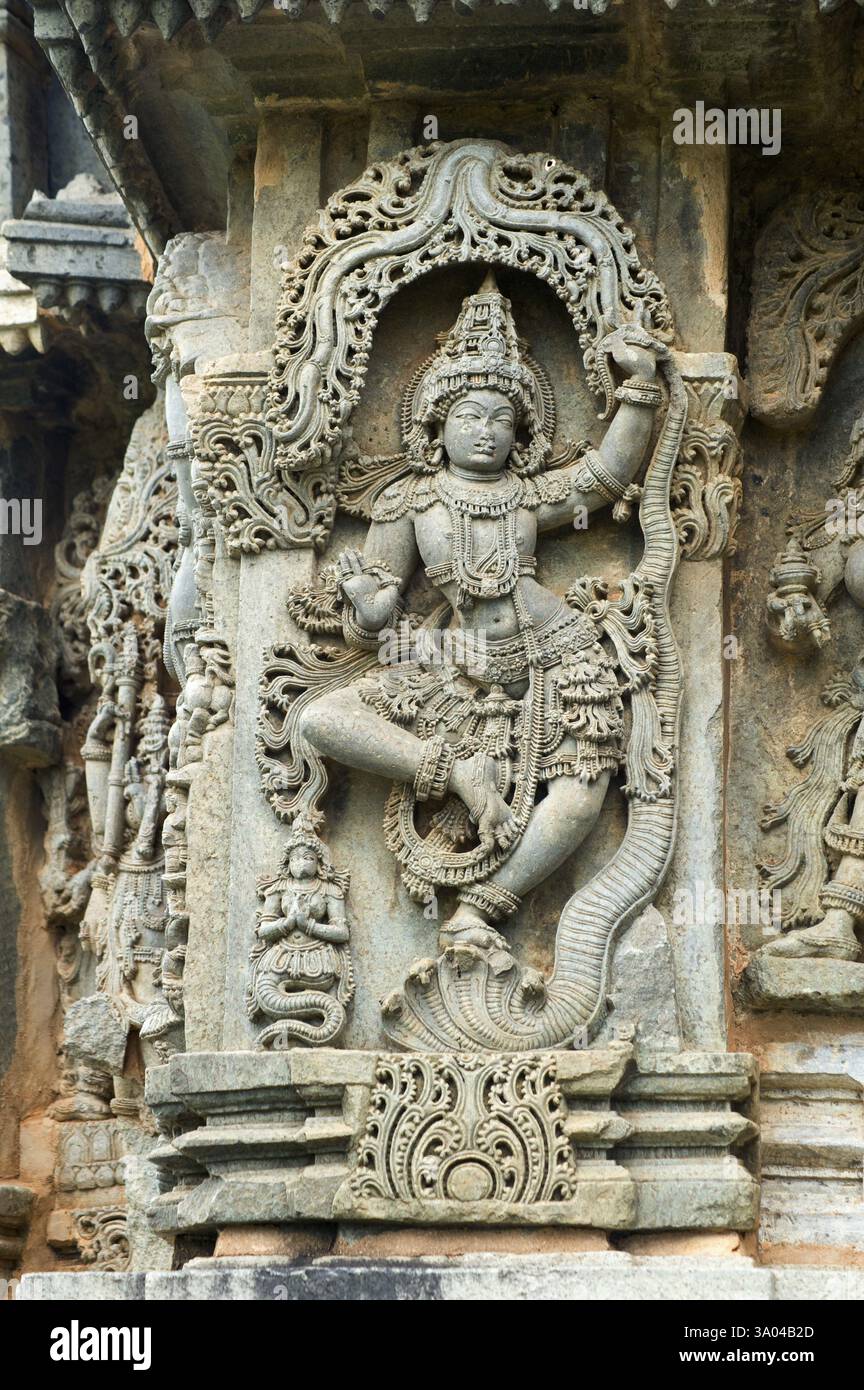 God krishna with snake carved on hoysaleswara temple, Halebid Halebidu ...