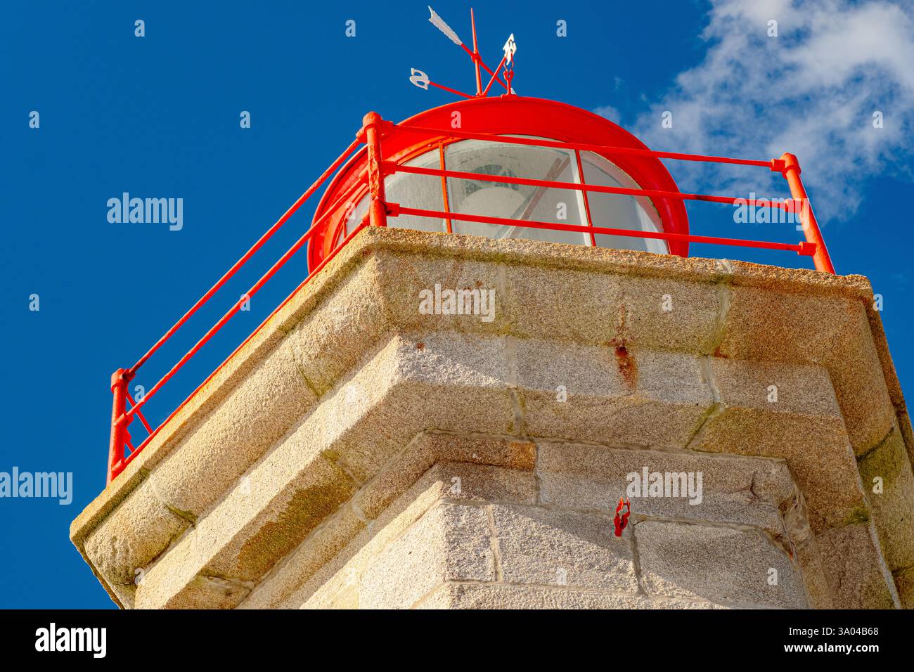 Lighthouse with Red Roof and red railings against Blue Sky Close Up ...