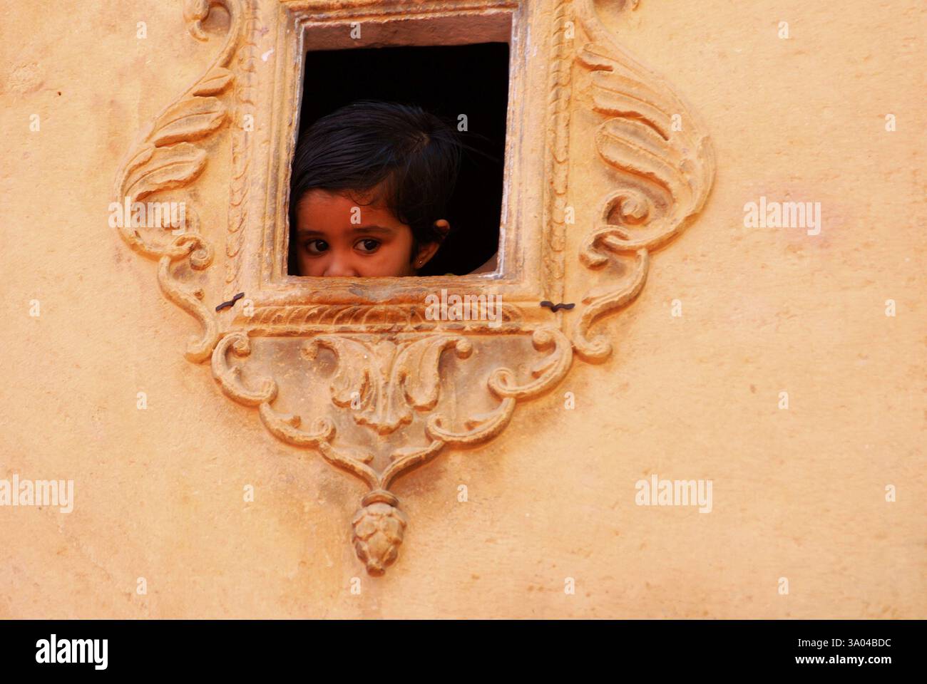 Kid peeping through window, Jodhpur, Rajasthan, India NO MR Stock Photo - Alamy
