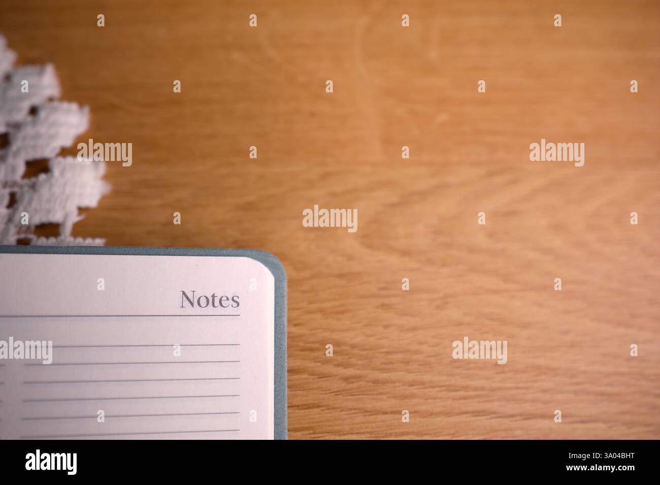 Lined page notes on the desk Stock Photo - Alamy