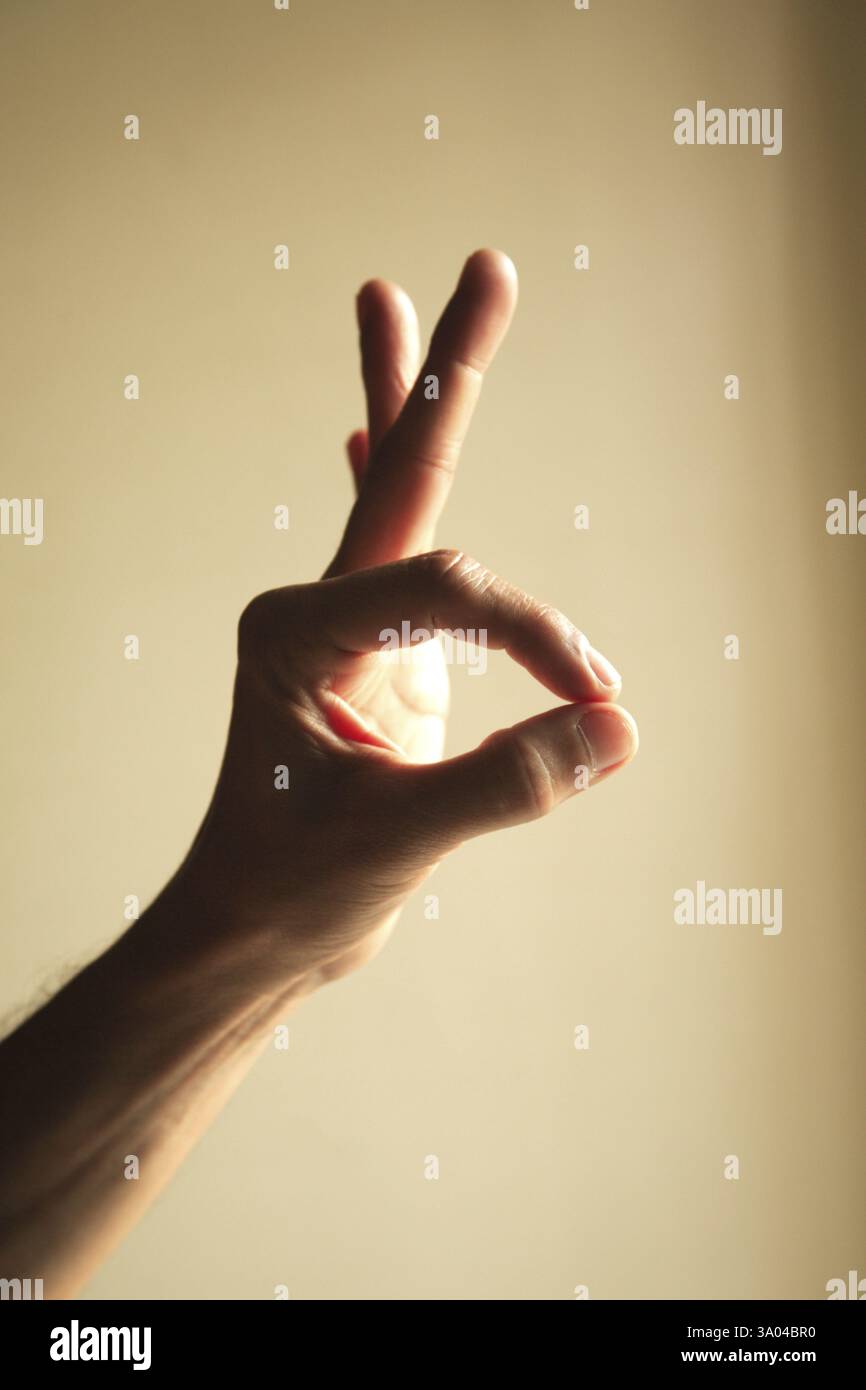 Hand shows signs fingers hi-res stock photography and images - Alamy