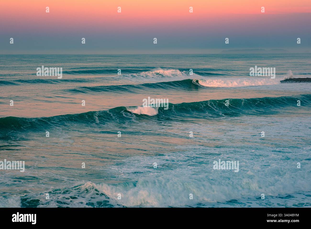 The most beautiful sunrise on the ocean coast. Golden hour on the beach ...