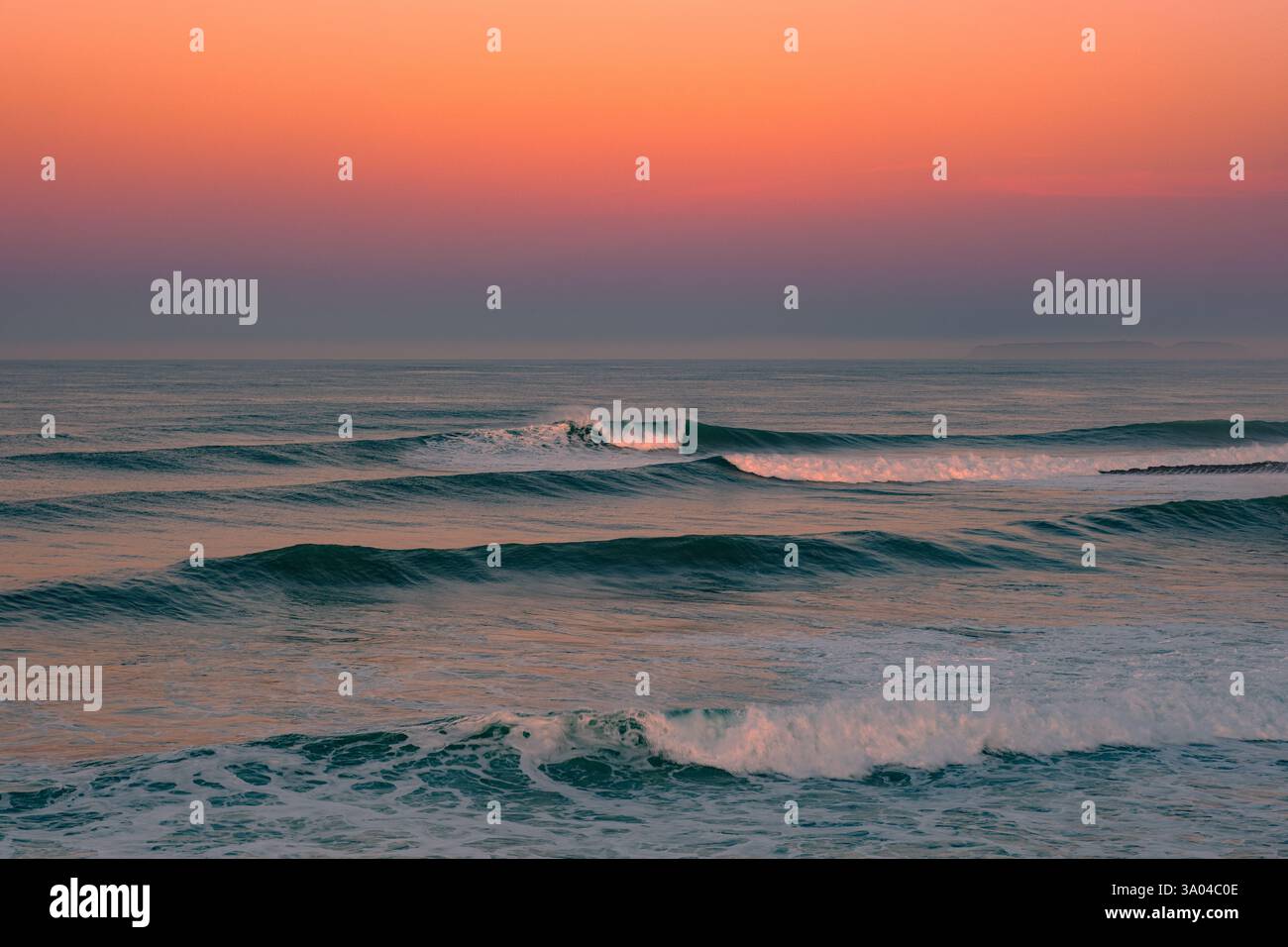 The most beautiful sunrise on the ocean coast. Golden hour on the beach ...