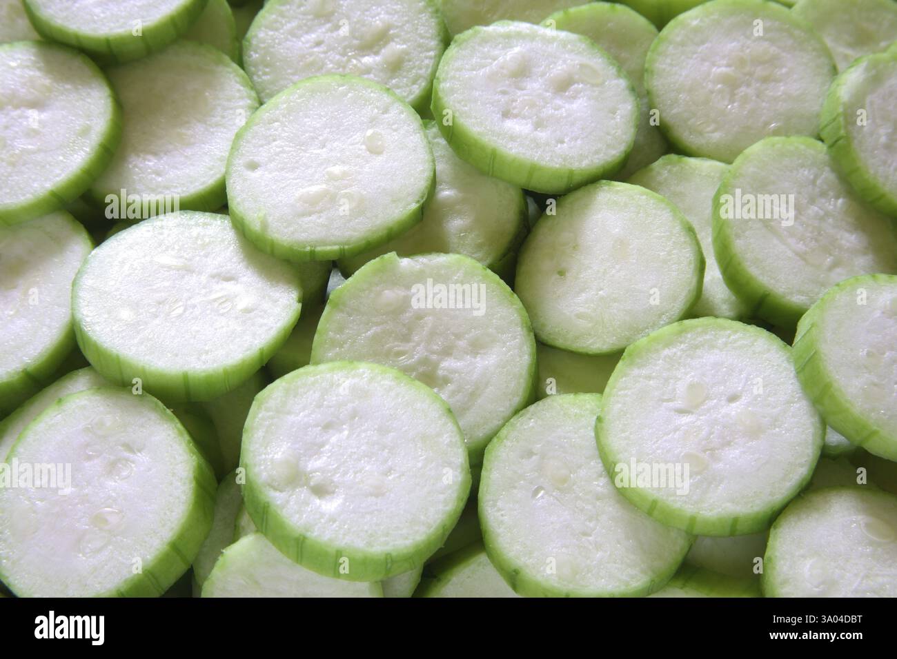 Green vegetable, round slices of ghiya nanuan creeper pompion kind of ...