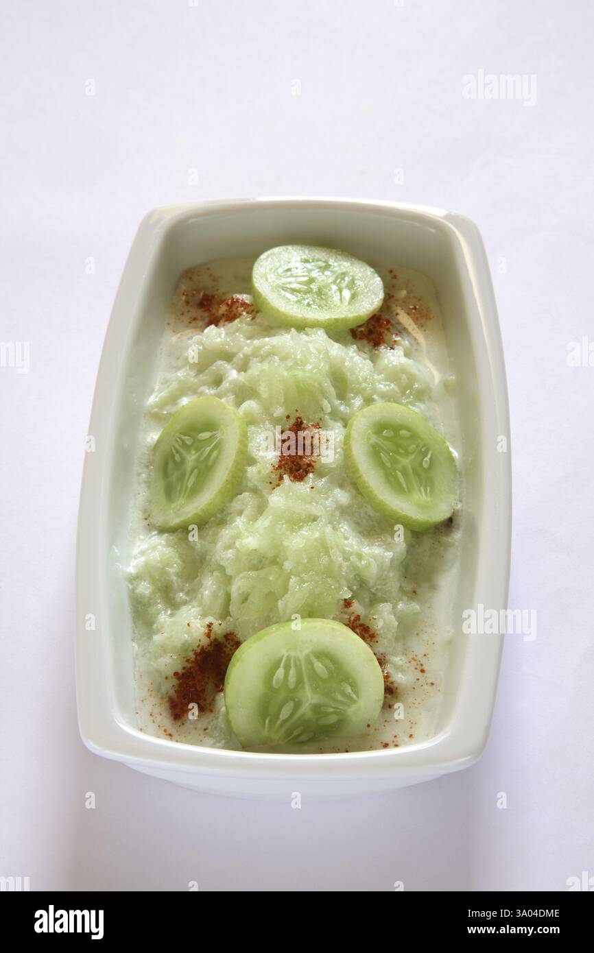 Vegetable salad, cucumber and curd kakri ka raita with slices in ...