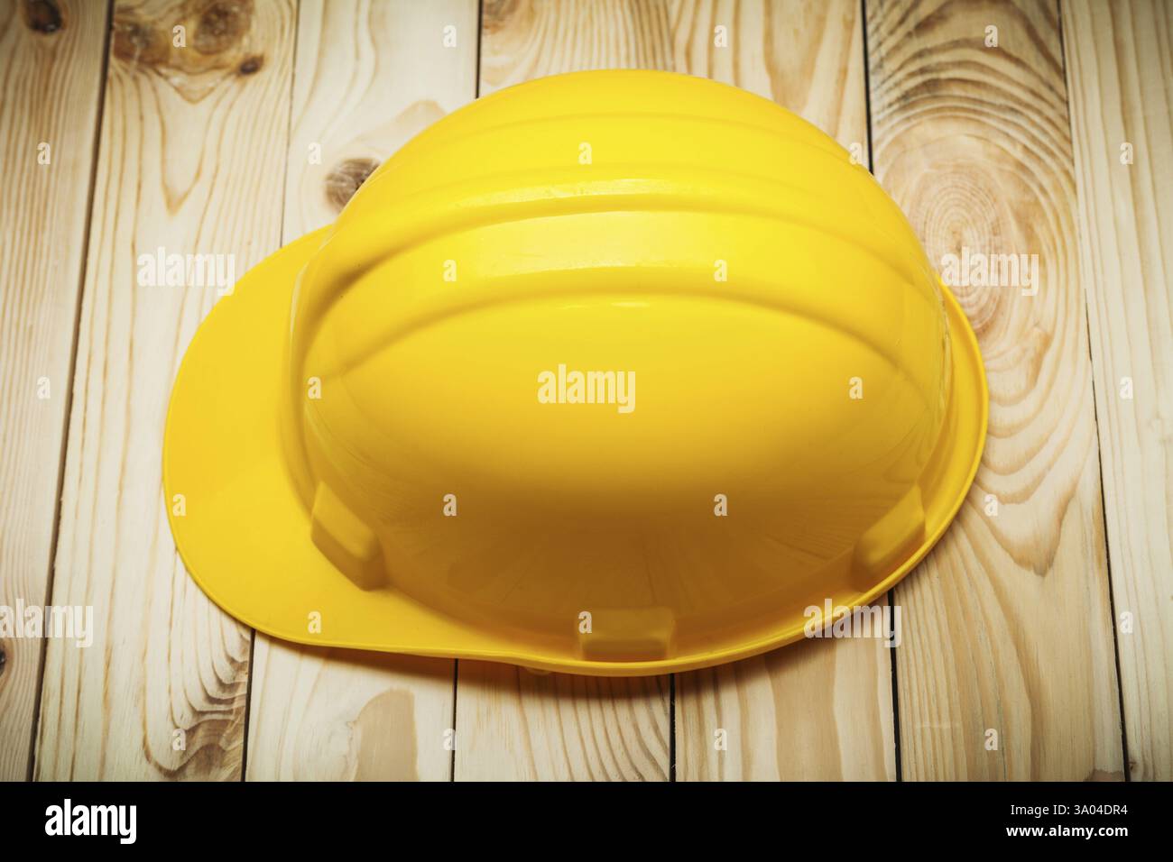 Yellow helmet construction hardhat hi-res stock photography and images ...