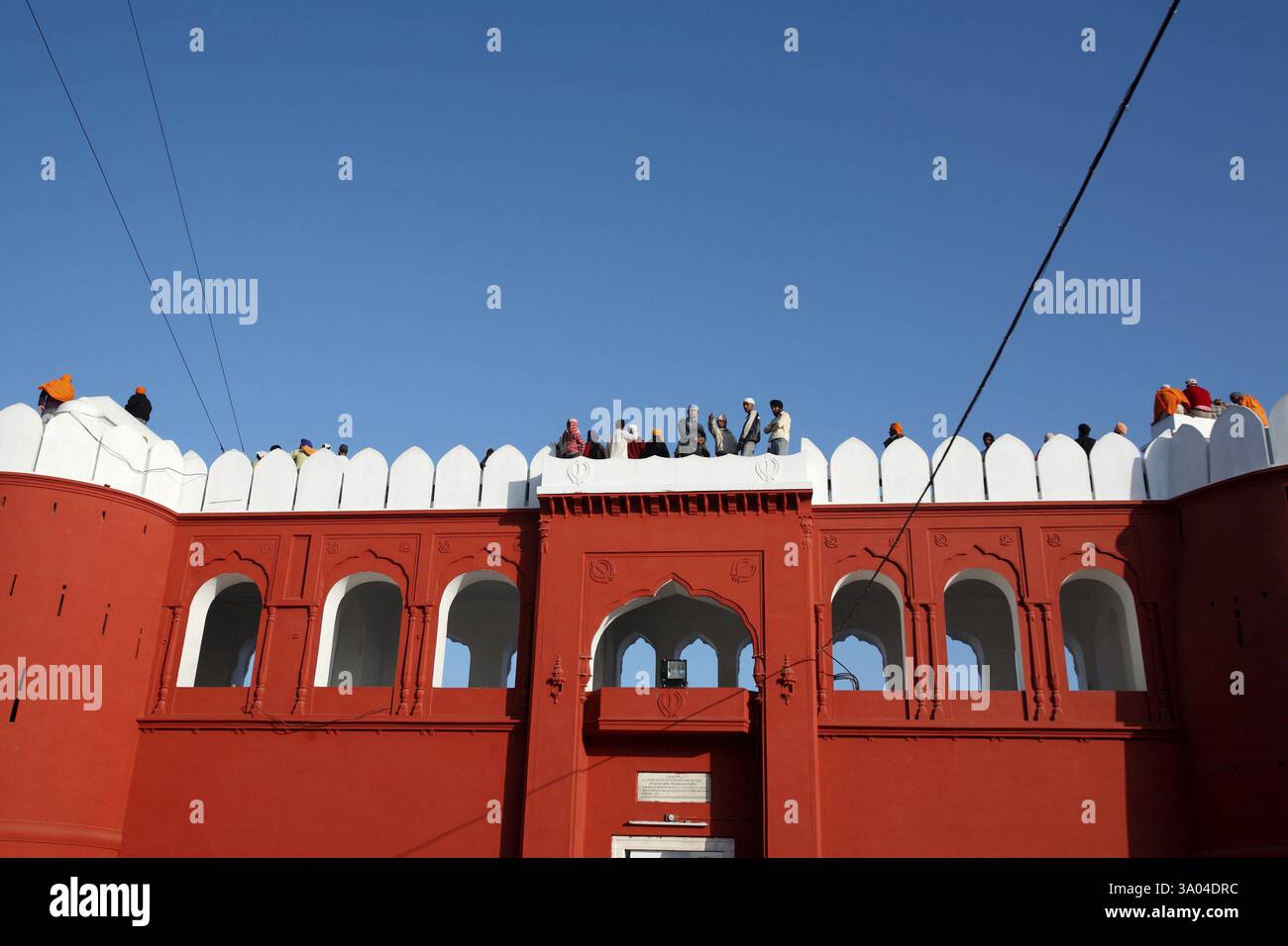 Devotees on top of Anandgarh forts during the celebration of Hola Mohalla at Anandpur Sahib ...