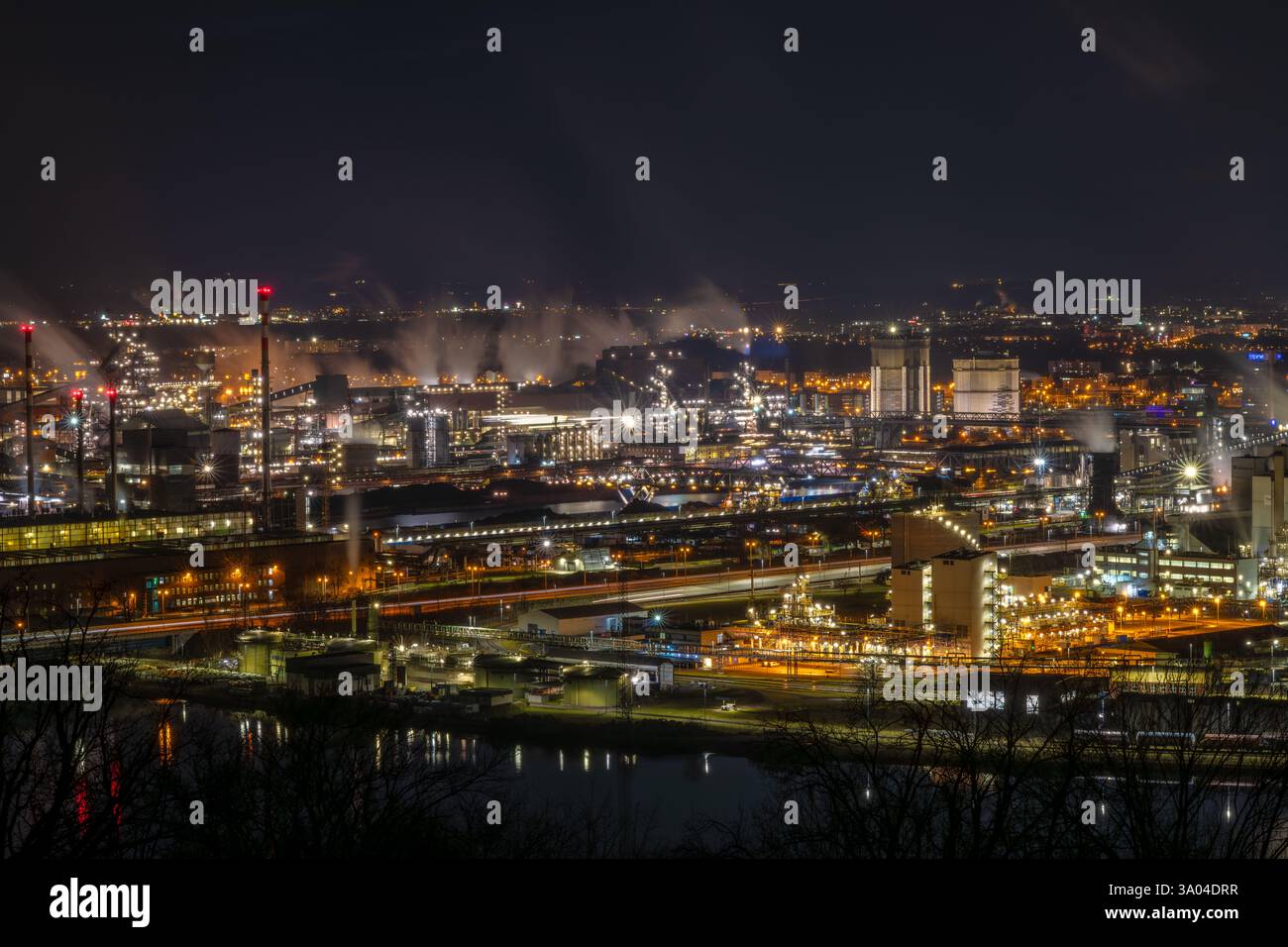 Night evening winter view from hill for city and factories in Linz ...