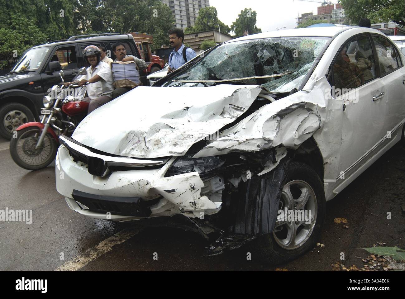 People watching car damaged in accident at Bombay Mumbai, Maharashtra ...