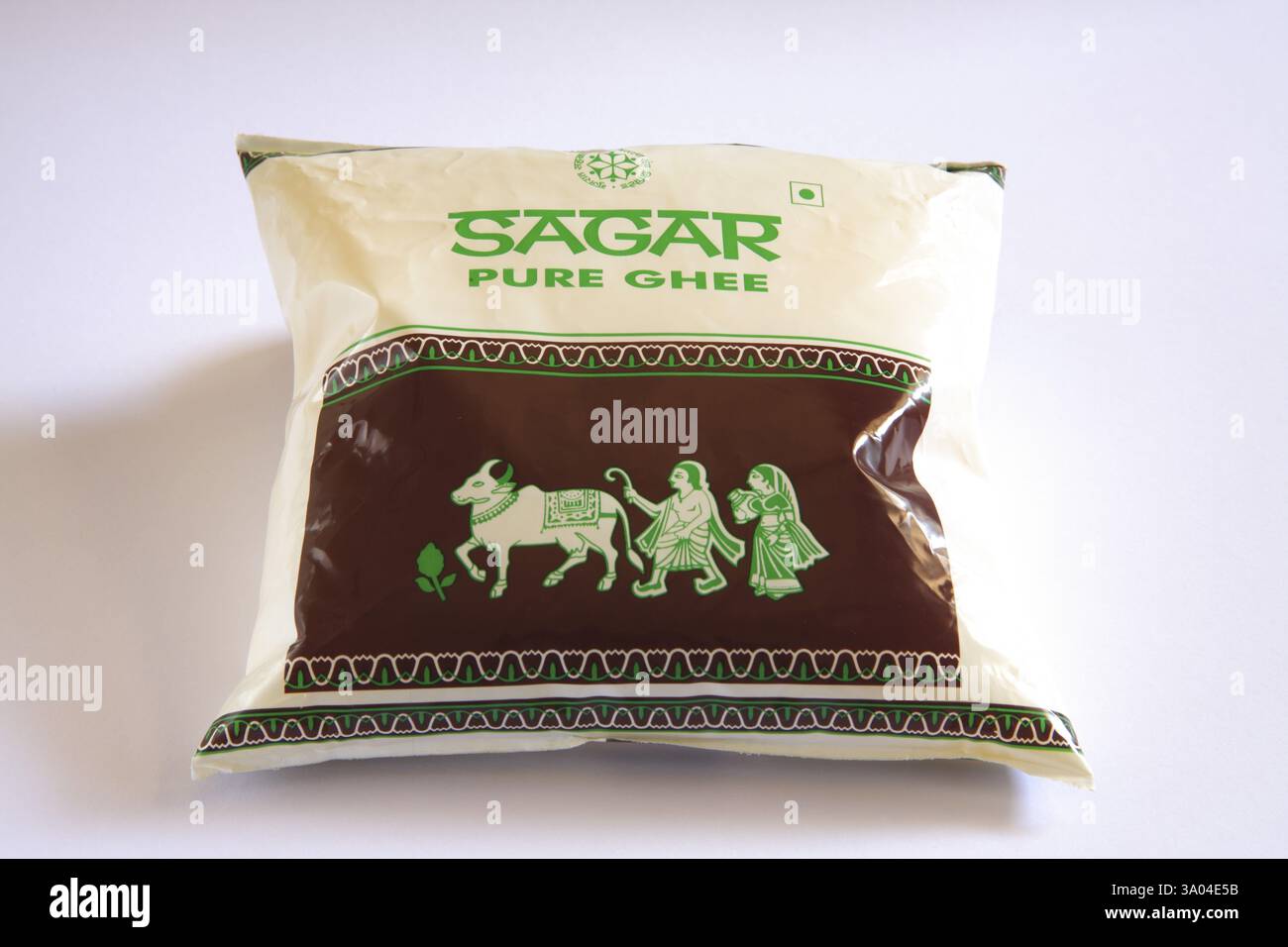 Sagar pure ghee in packet on white background Stock Photo - Alamy