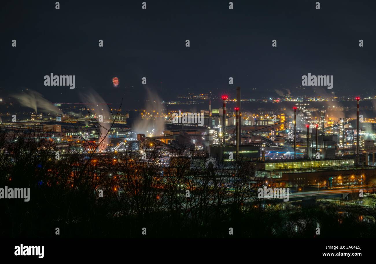 Night evening winter view from hill for city and factories in Linz ...