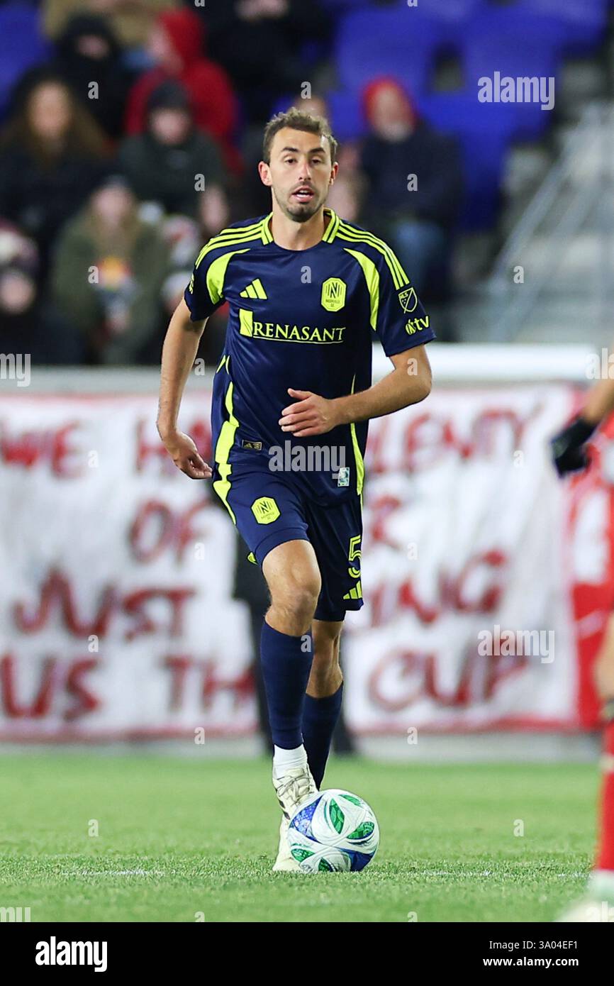 HARRISON, NJ - MARCH 01: Jack Maher #5 of Nashville SC controls the ...