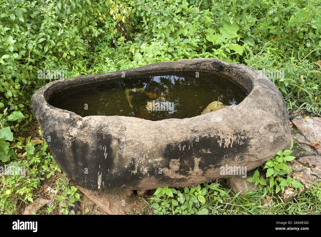 Stone water container located in Chemmanthatta temple, Kerala, India ...