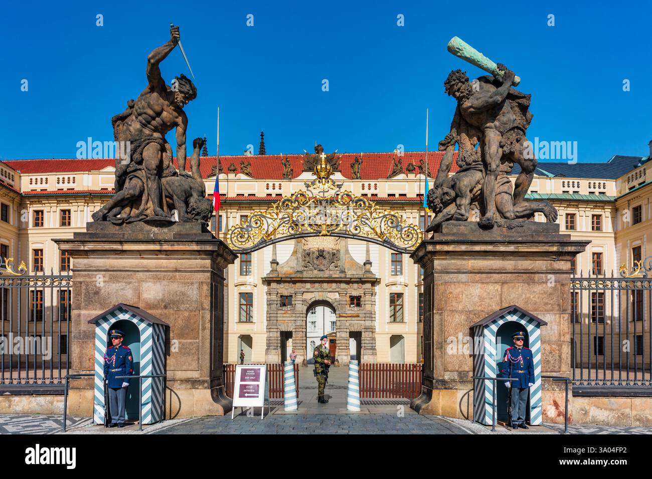 Prague, Czechia - April 11, 2024: Historic gates of Prague Castle with ...