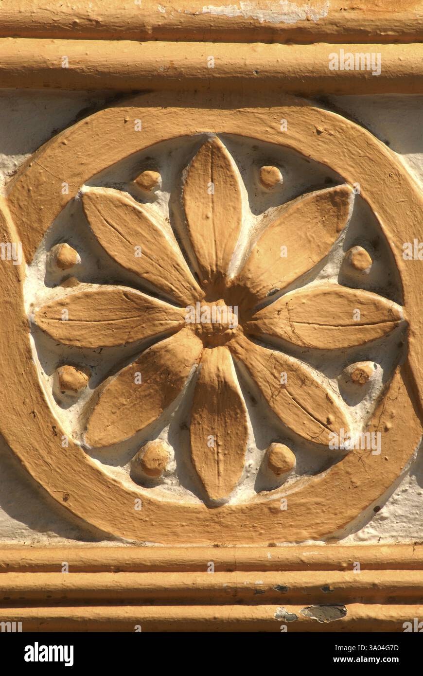 Floral design in circle relief work in cement at Shree Chaturshringi ...