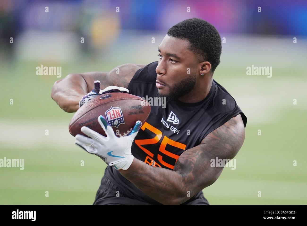 Kansas running back Devin Neal runs the 40-yard dash at the NFL ...