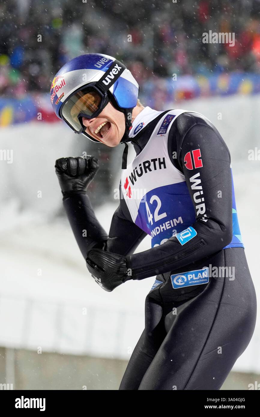 Andreas Wellinger, of Germany, reacts after his second round jump of ...