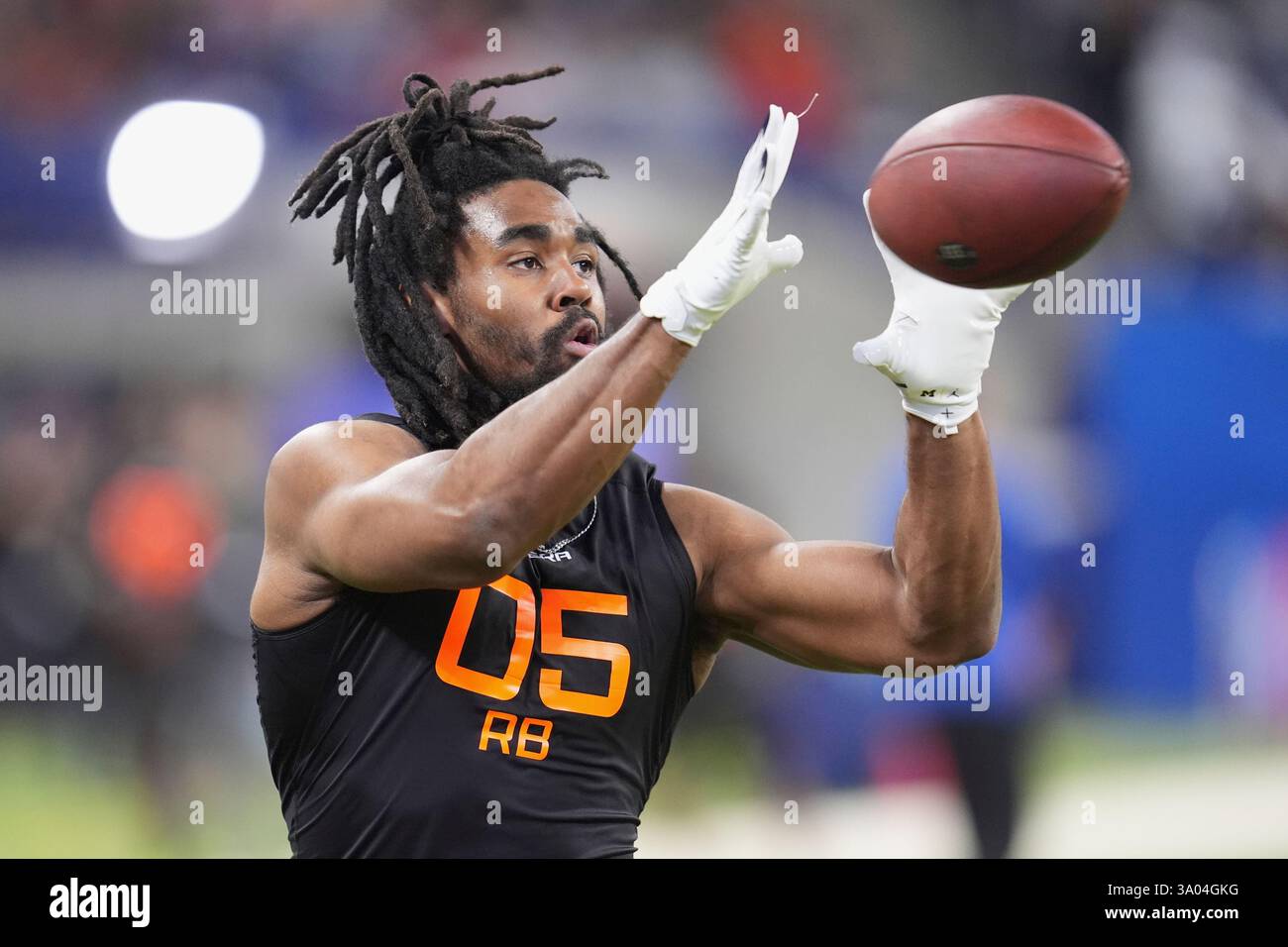 Michigan running back Donovan Edwards runs the 40-yard dash at the NFL ...