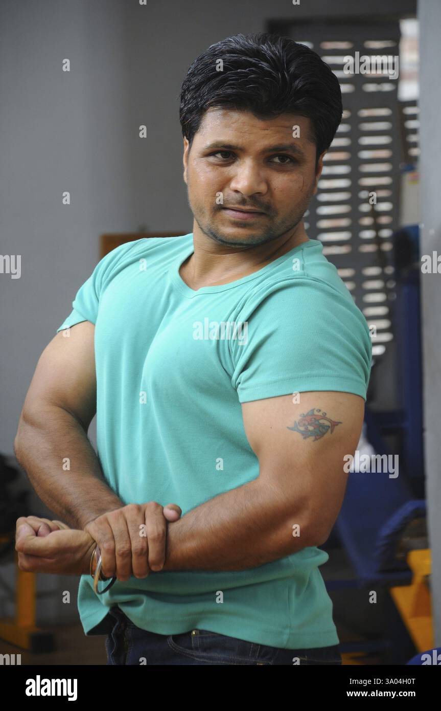 Athlete guy showing arm hi-res stock photography and images - Alamy