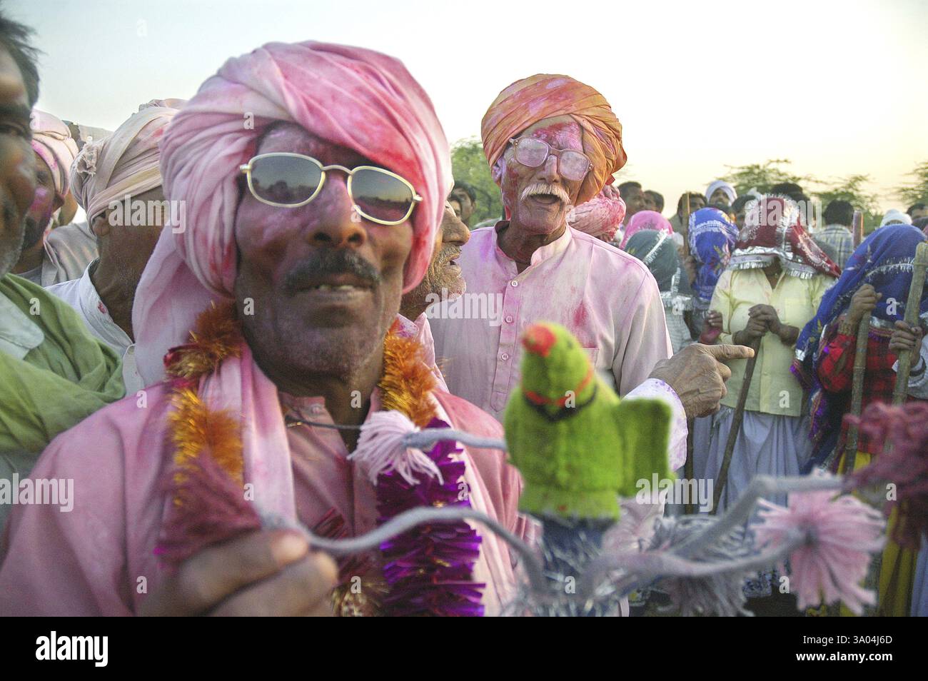 Indian devotees singing and dancing during Holi celebrations in village ...