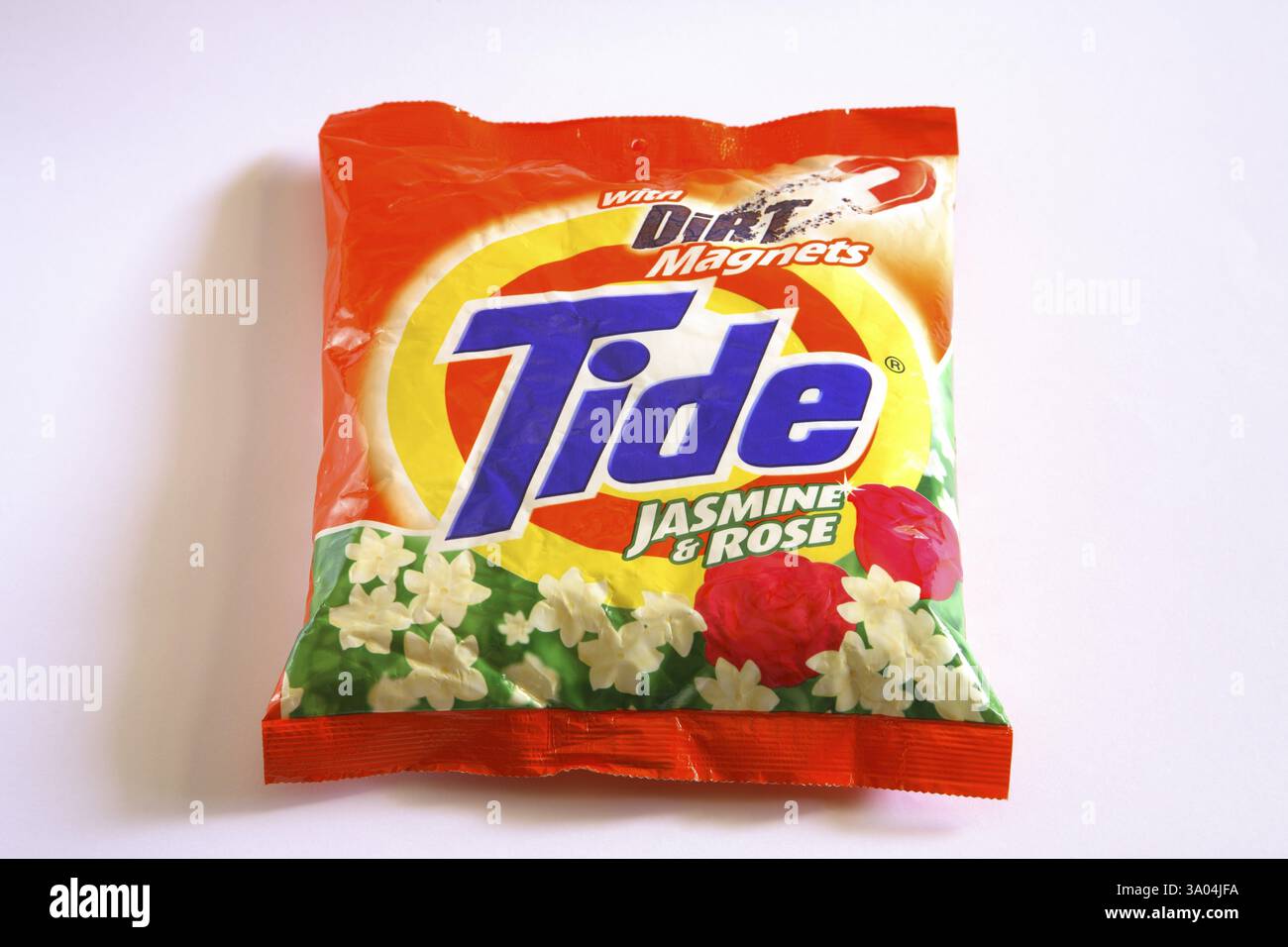 Detergent powder tide packet on white background Stock Photo - Alamy