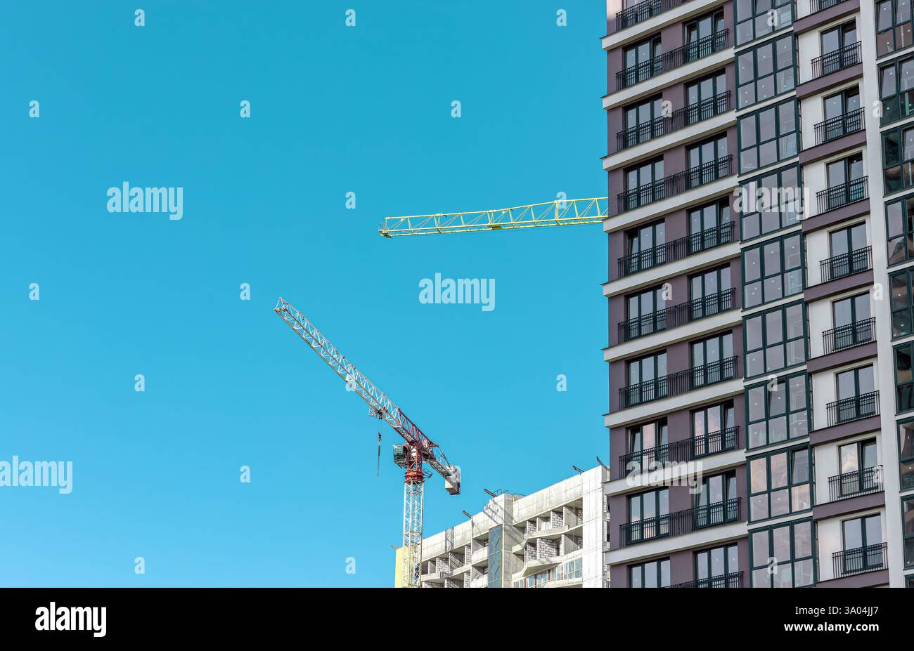 Under construction multistory building in downtown metropolis. Crane ...
