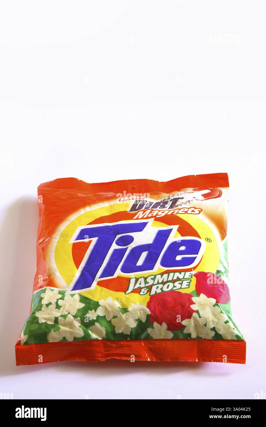 Detergent powder tide packet on white background Stock Photo - Alamy