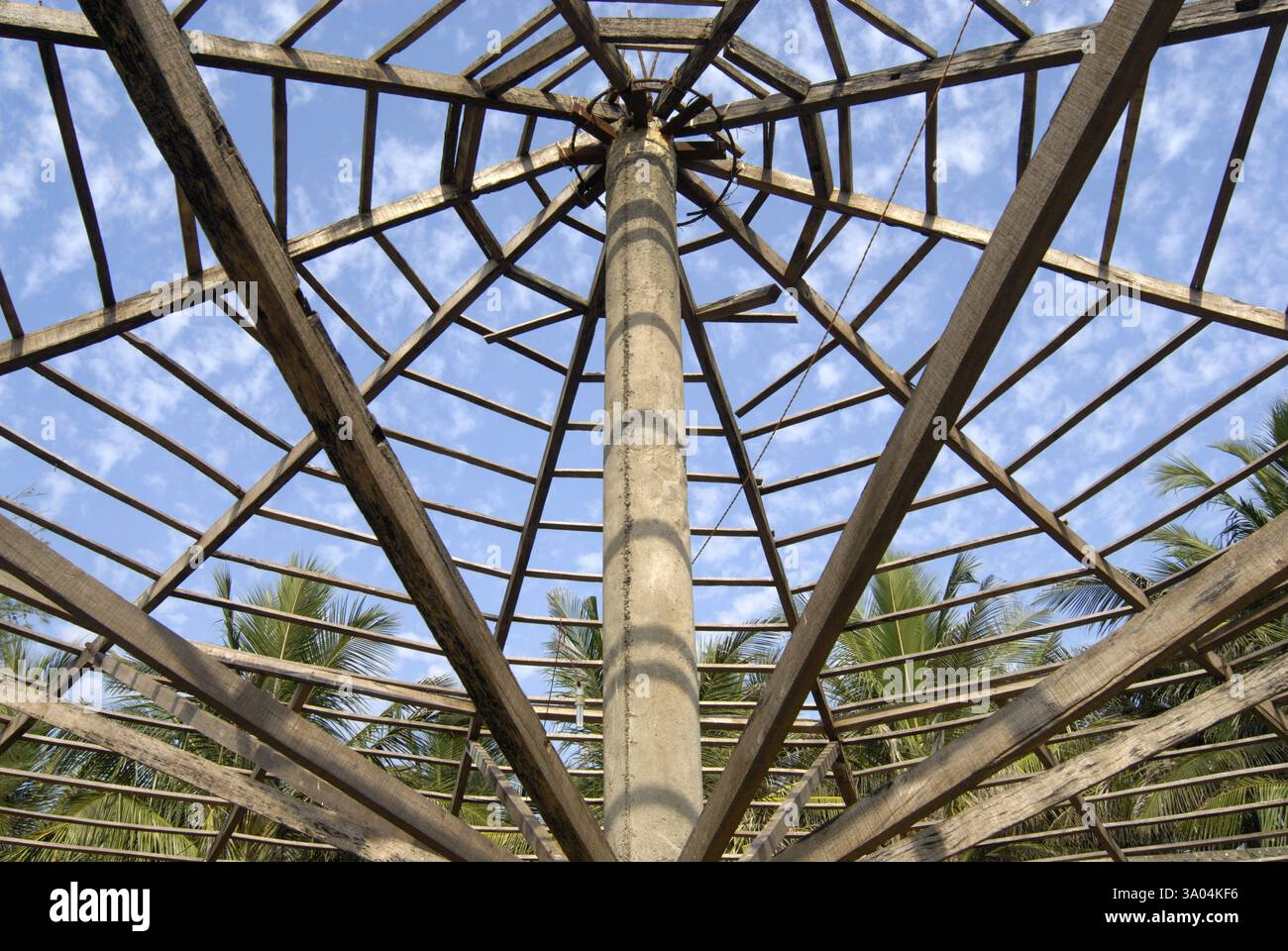 Web like wooden structure open roof of house without tiles, Bassein now ...
