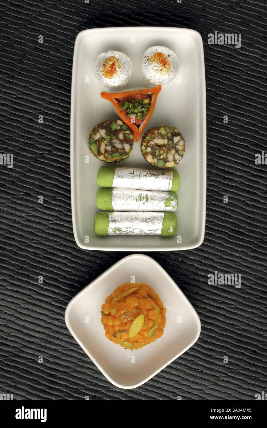 Mixed varieties of Indian sweets with dry fruits, India, Asia Stock ...